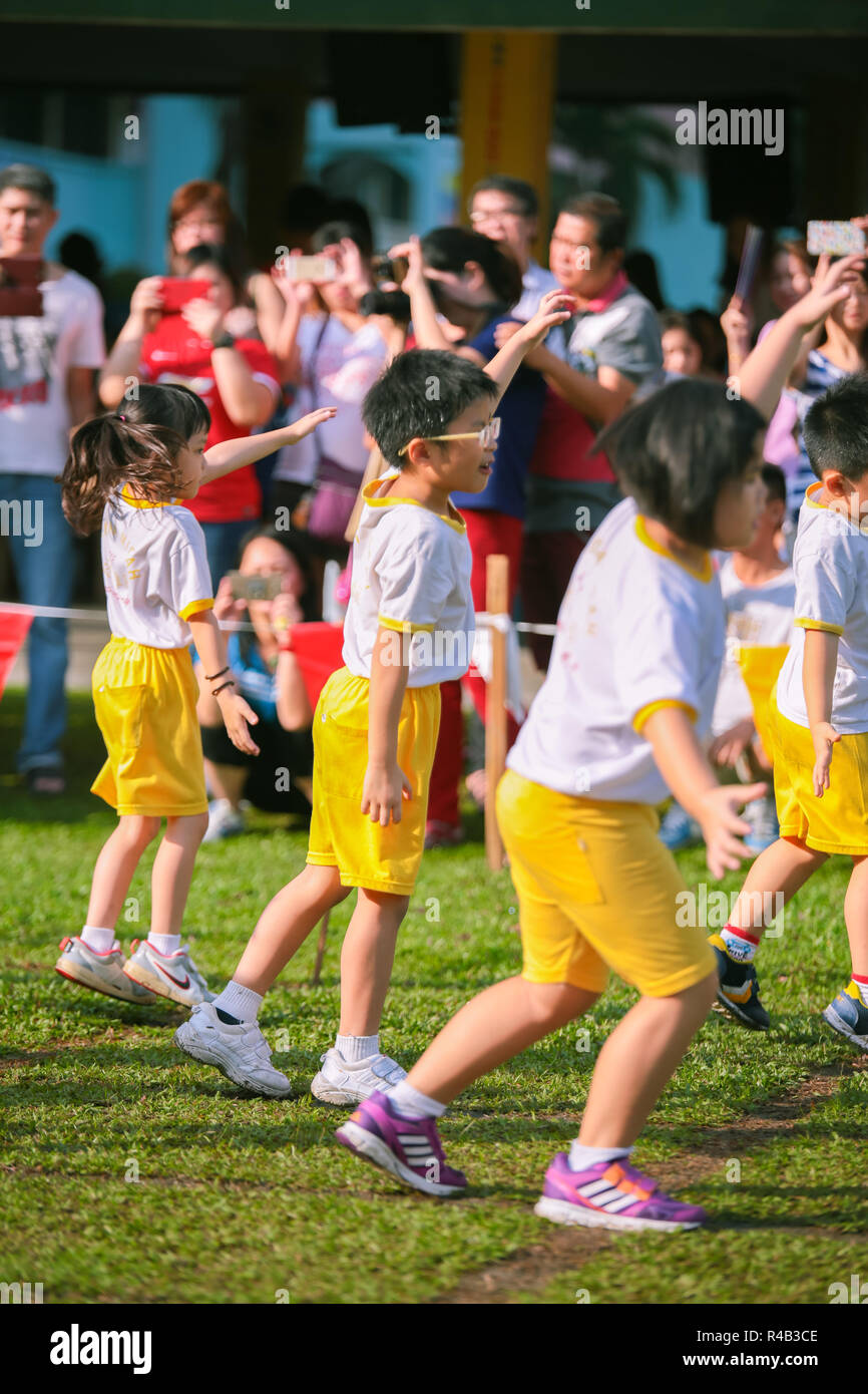Children performing their dance during their kindergarten sports day ...