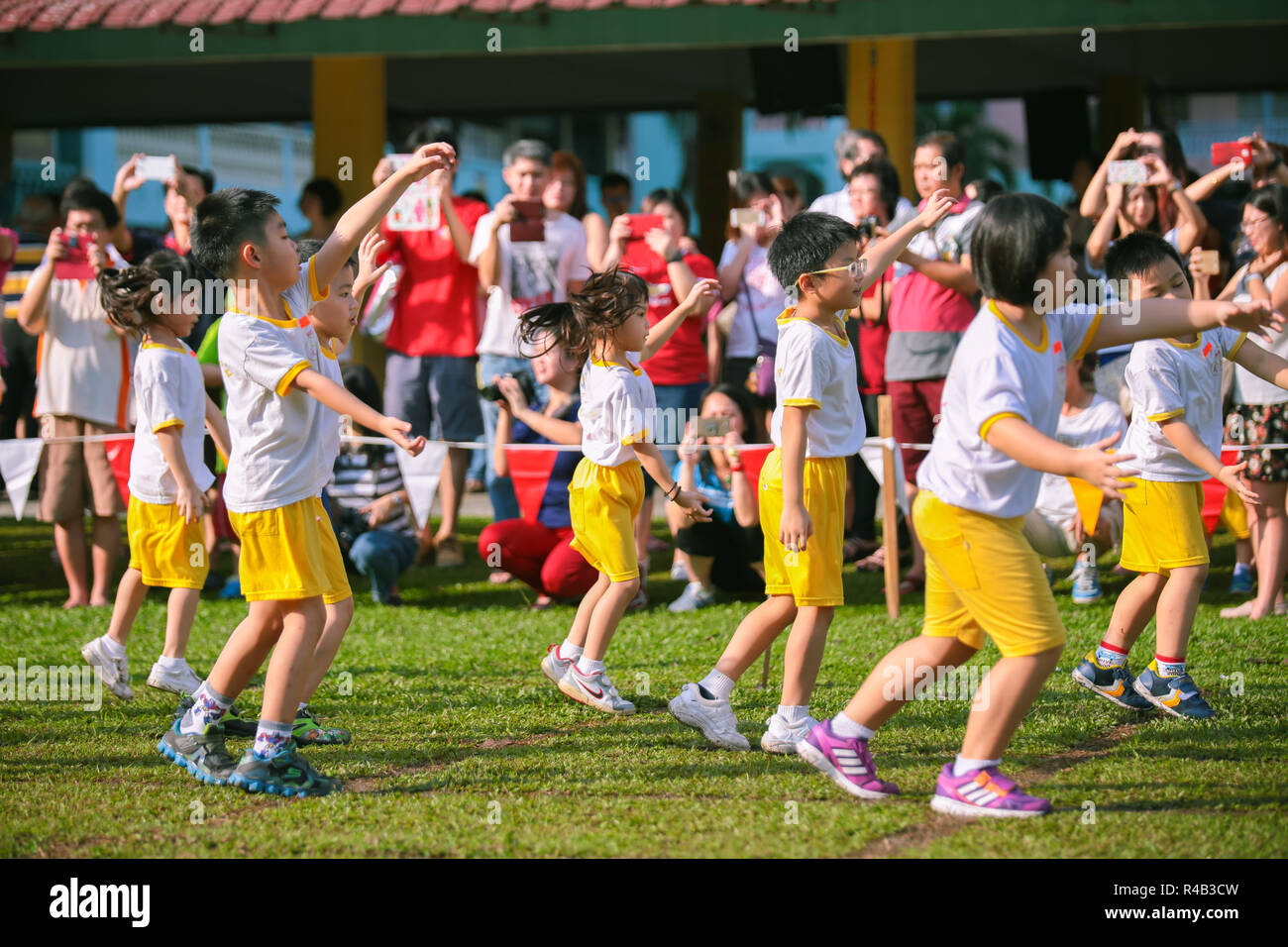 Children performing their dance during their kindergarten sports day ...