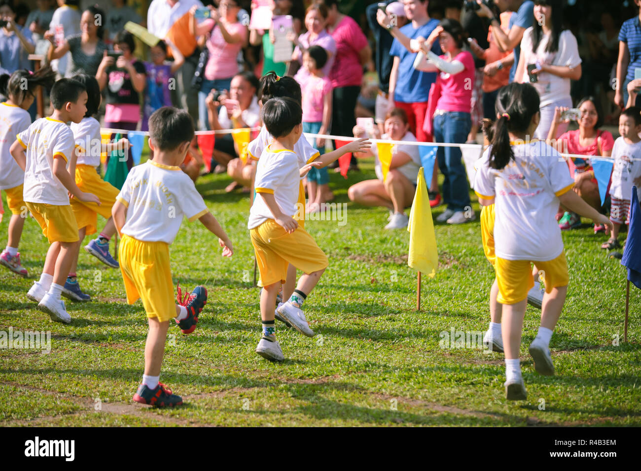 Children performing their dance during their kindergarten sports day ...