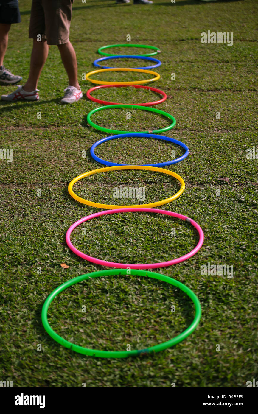 Hula hoops lying on the field Stock Photo - Alamy