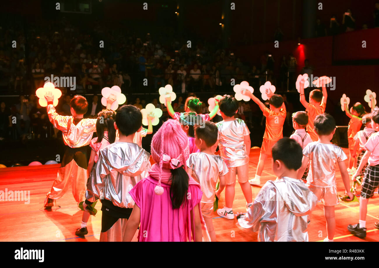 Children singing on stage during their kindergarten concert day Stock ...