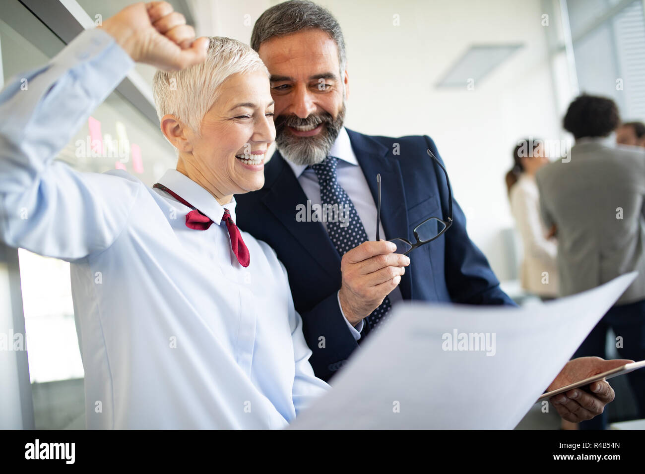 Happy african office worker hi-res stock photography and images - Alamy