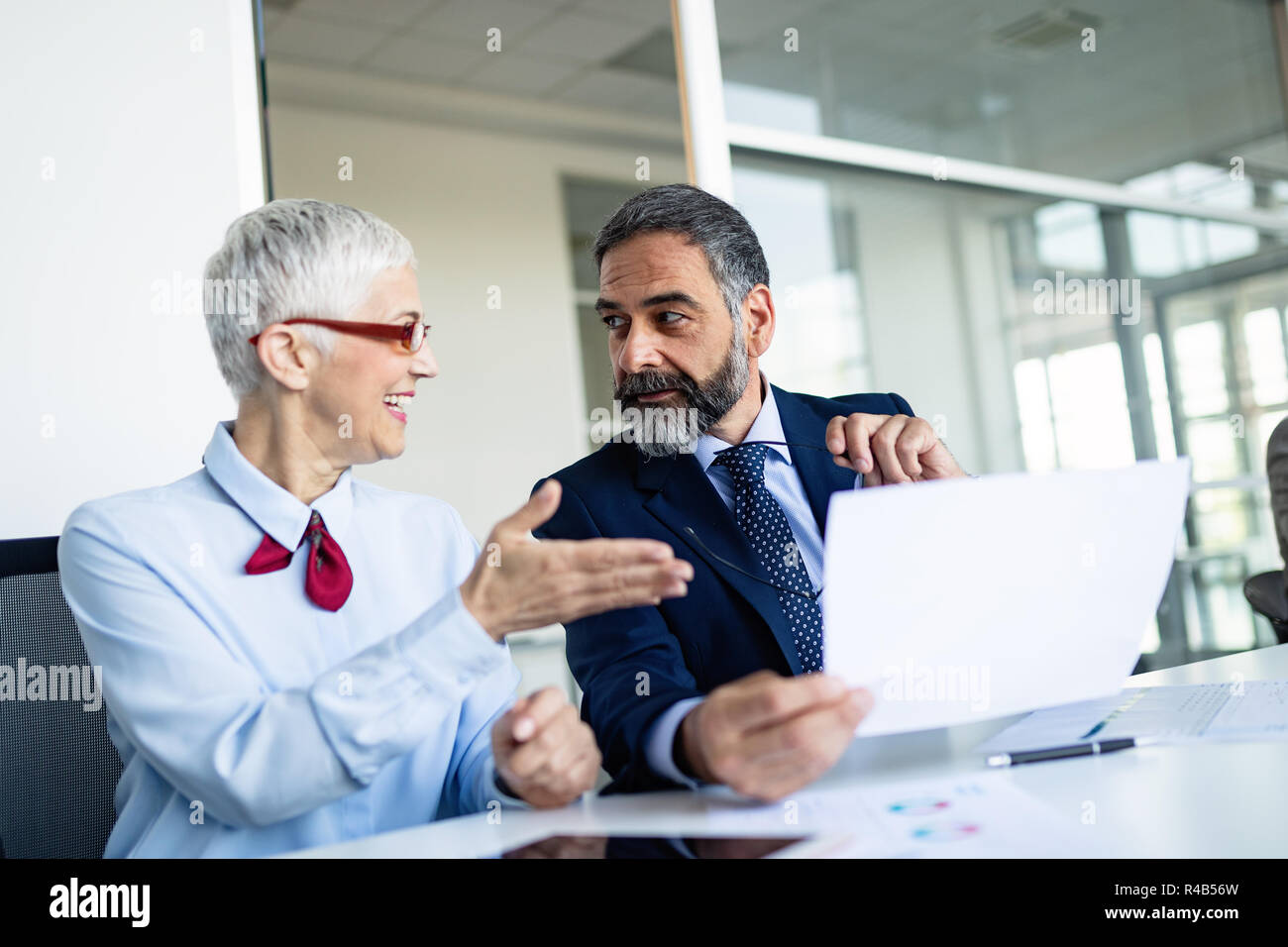 Senior business accountants working together at modern office Stock ...