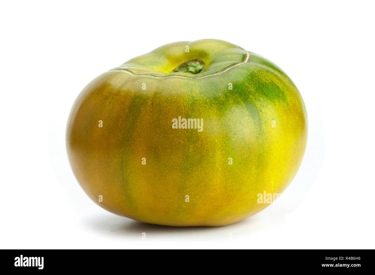 Green ripe tomatoes "Magic Glow" isolated on white Stock Photo - Alamy