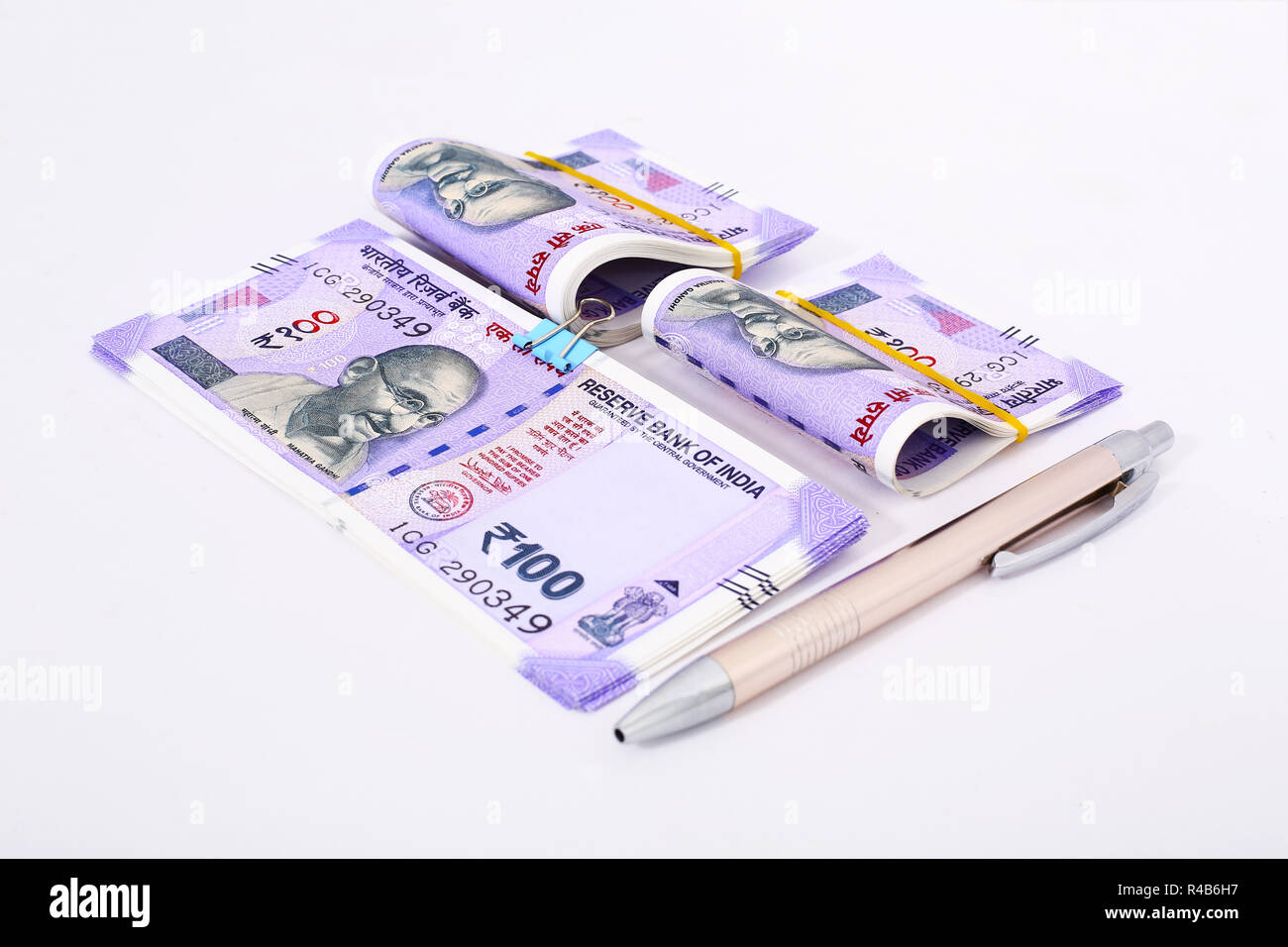 New Indian purple notes and pen. Isolated on the white background Stock ...