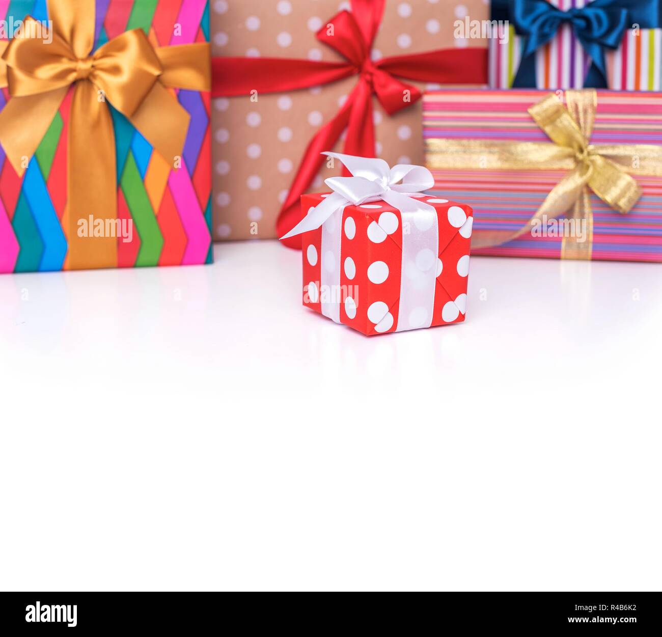Bright gift boxes on a white background Stock Photo - Alamy