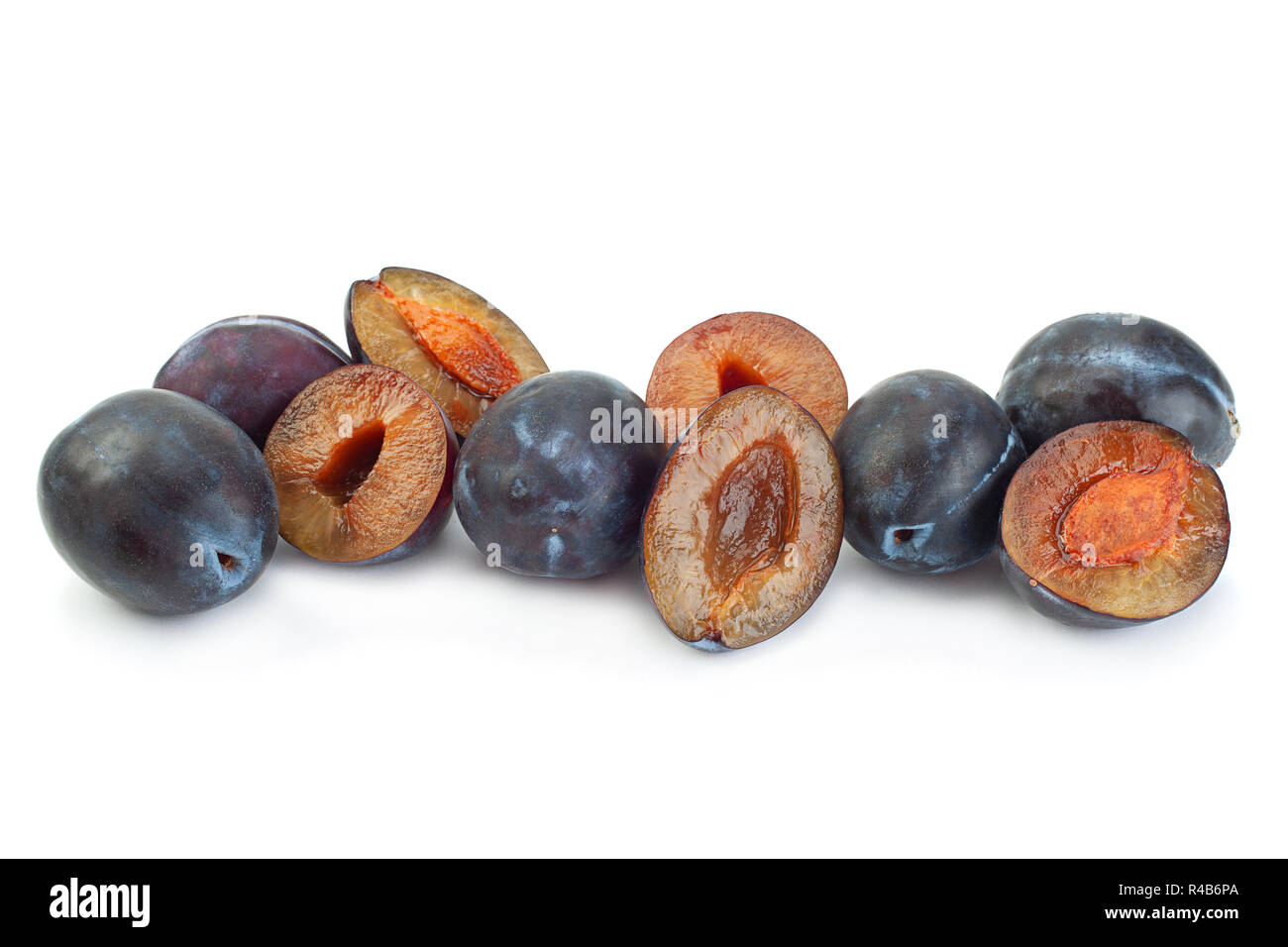 Blue plum fruit closeup isolated on white background Stock Photo - Alamy