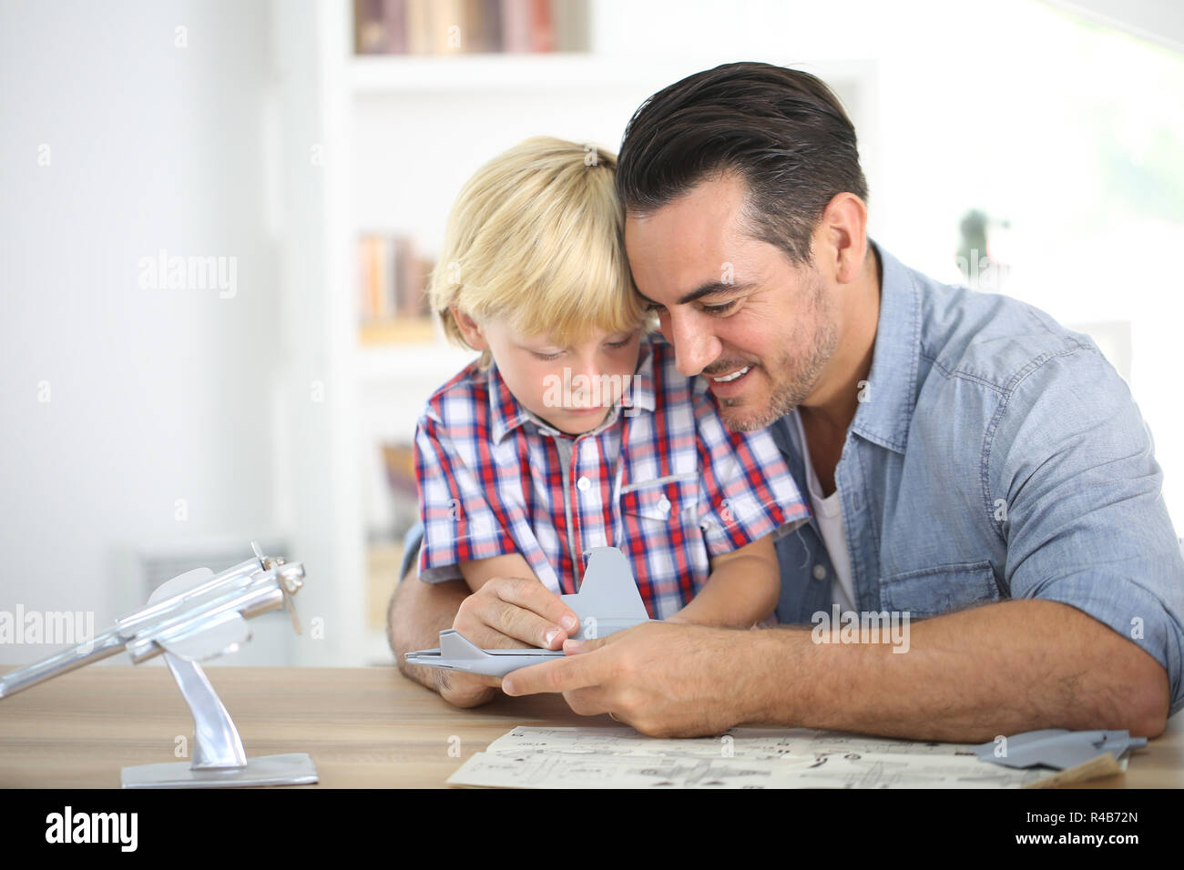 Boy making model plane hi-res stock photography and images - Alamy