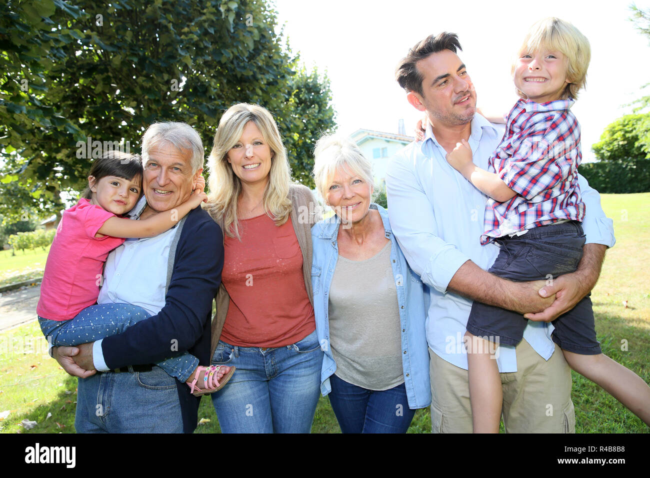 3-generation-family enjoying time together Stock Photo - Alamy