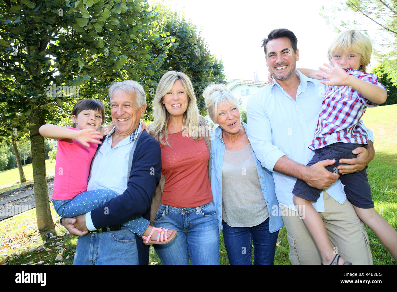 3-generation-family enjoying time together Stock Photo - Alamy