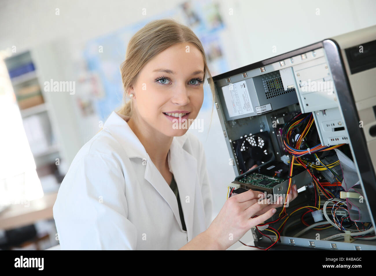 Student girl in technology fixug computer hard drive Stock Photo - Alamy
