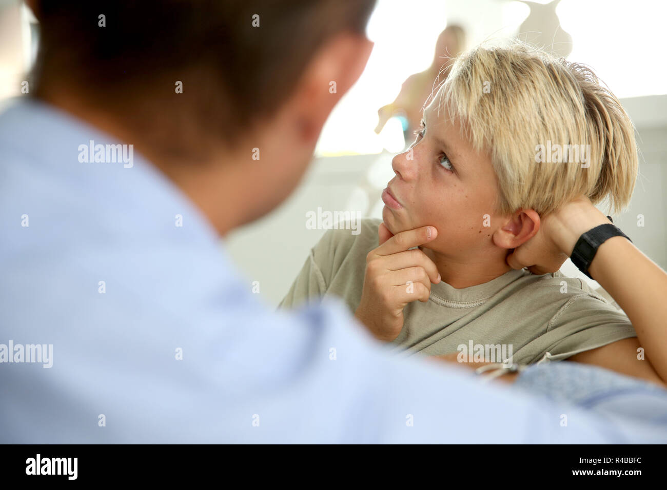 Daddy talking to his son about serious things Stock Photo - Alamy