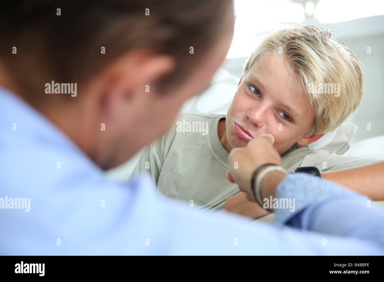 Daddy talking to his son about serious things Stock Photo - Alamy