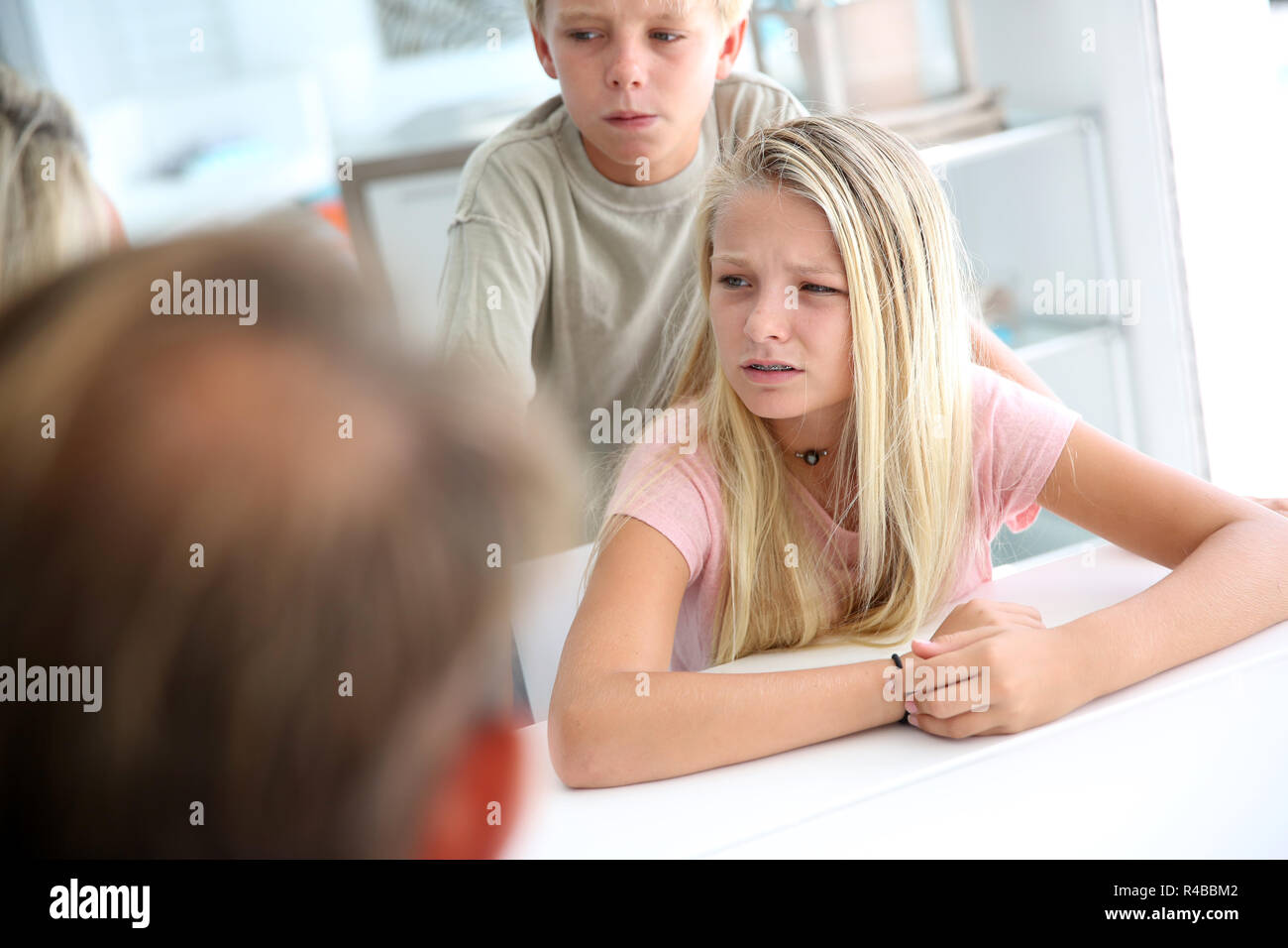 Kids listening carefully to their parents Stock Photo - Alamy