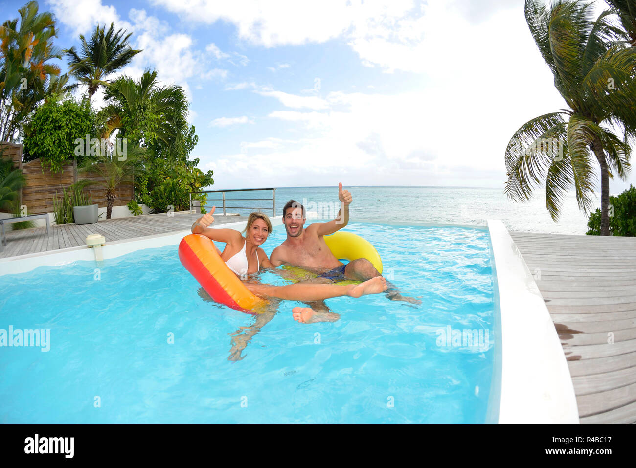 Woman swims in infinity hi-res stock photography and images - Alamy