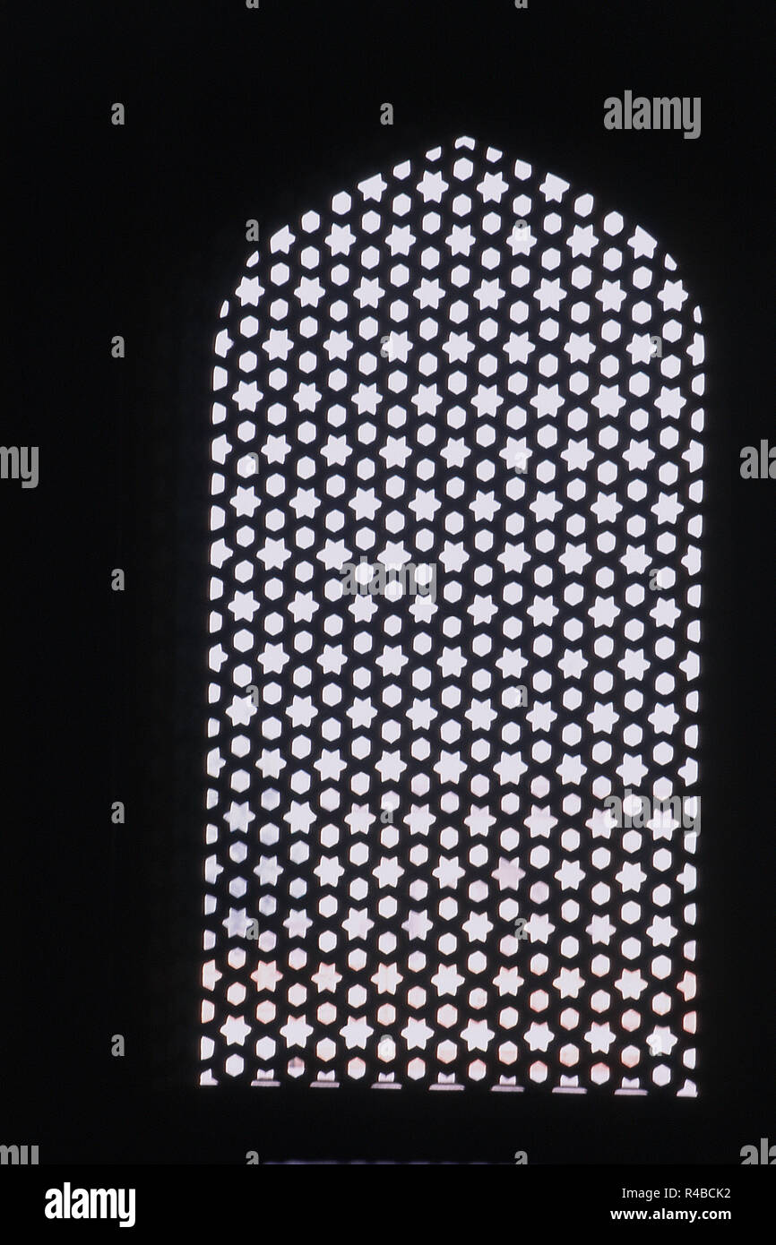 Silhouetted red sandstone carved jalli, Humayun's Tomb, Delhi, India ...