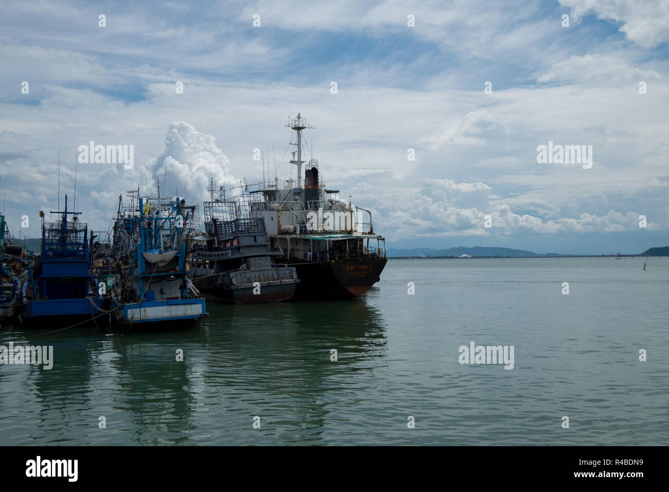 Traditional fishing boats in port in Songkhla, Thailand Stock Photo - Alamy