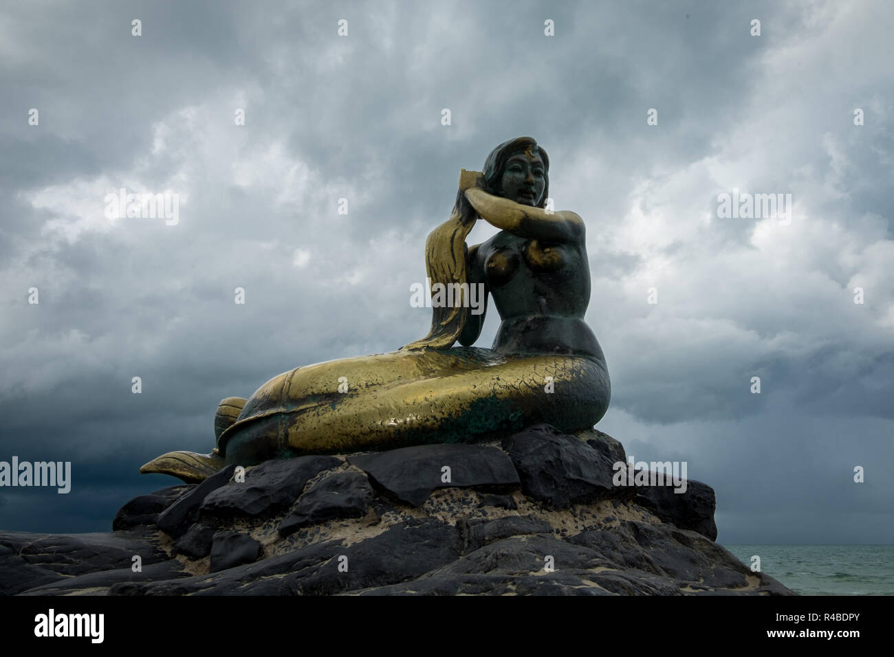 The famous Golden Mermaid Statue at the beach in Songkhla, Thailand ...