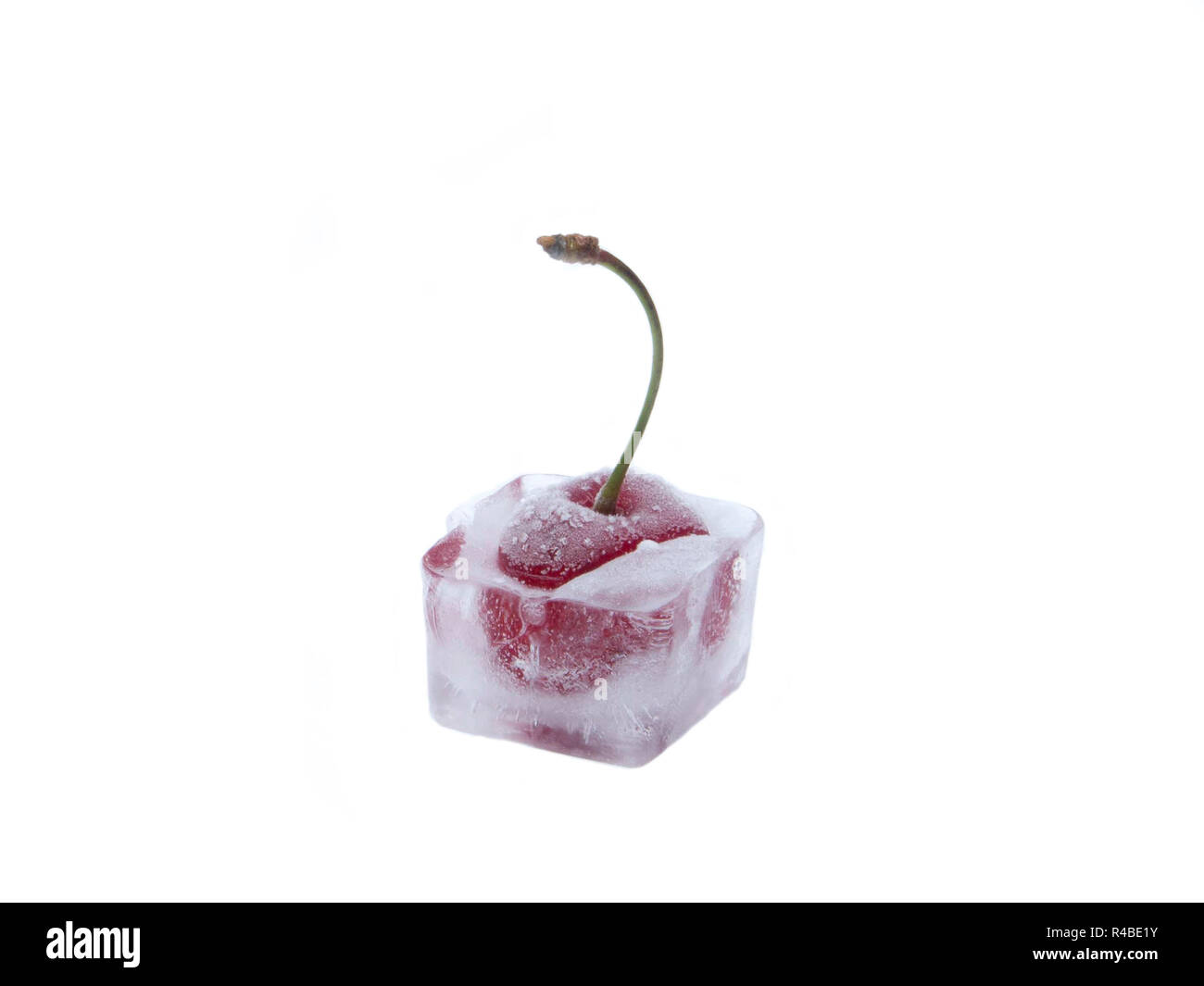 cherry frozen in ice Stock Photo - Alamy