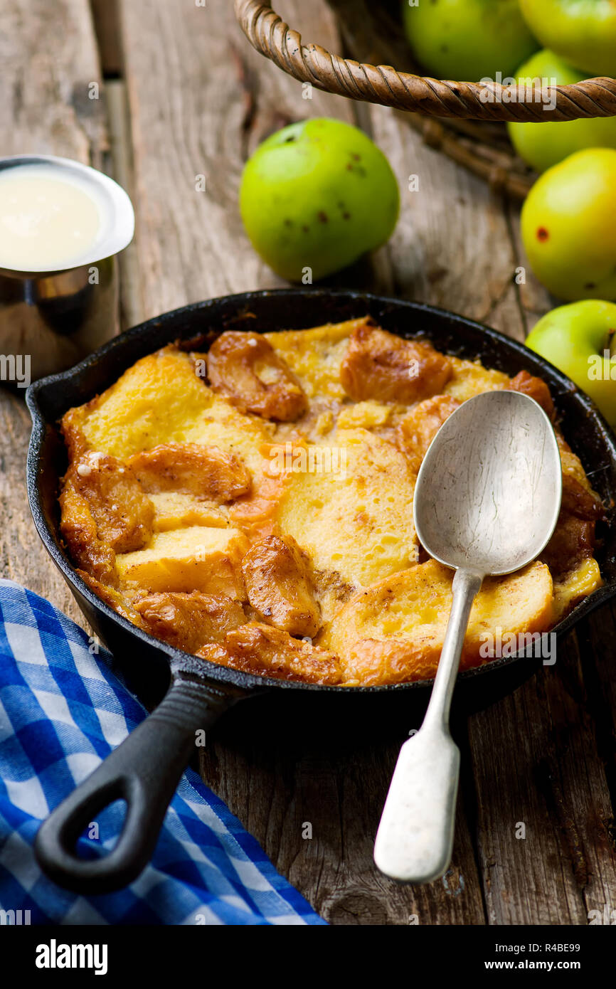 CARAMEL APPLE STRATA in a pig-iron frying pan. style rustic. selective ...