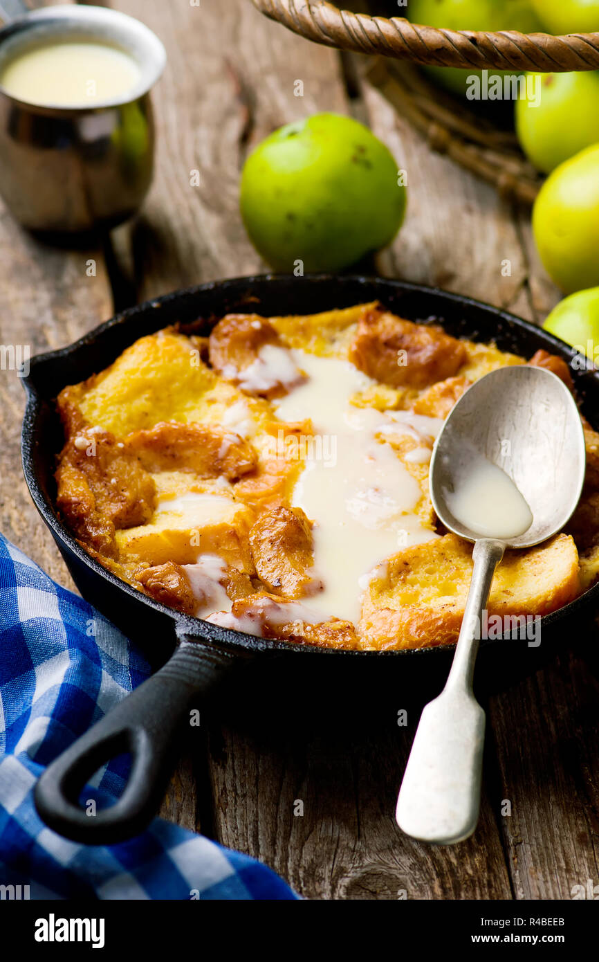 CARAMEL APPLE STRATA in a pig-iron frying pan. style rustic. selective ...