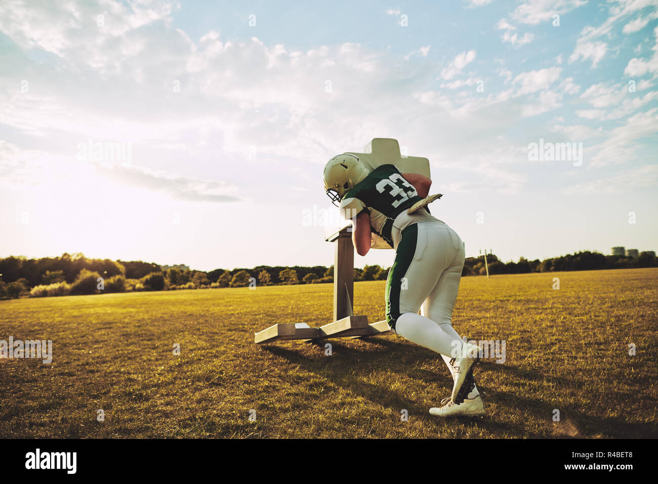American football player pushing sled hi-res stock photography and ...