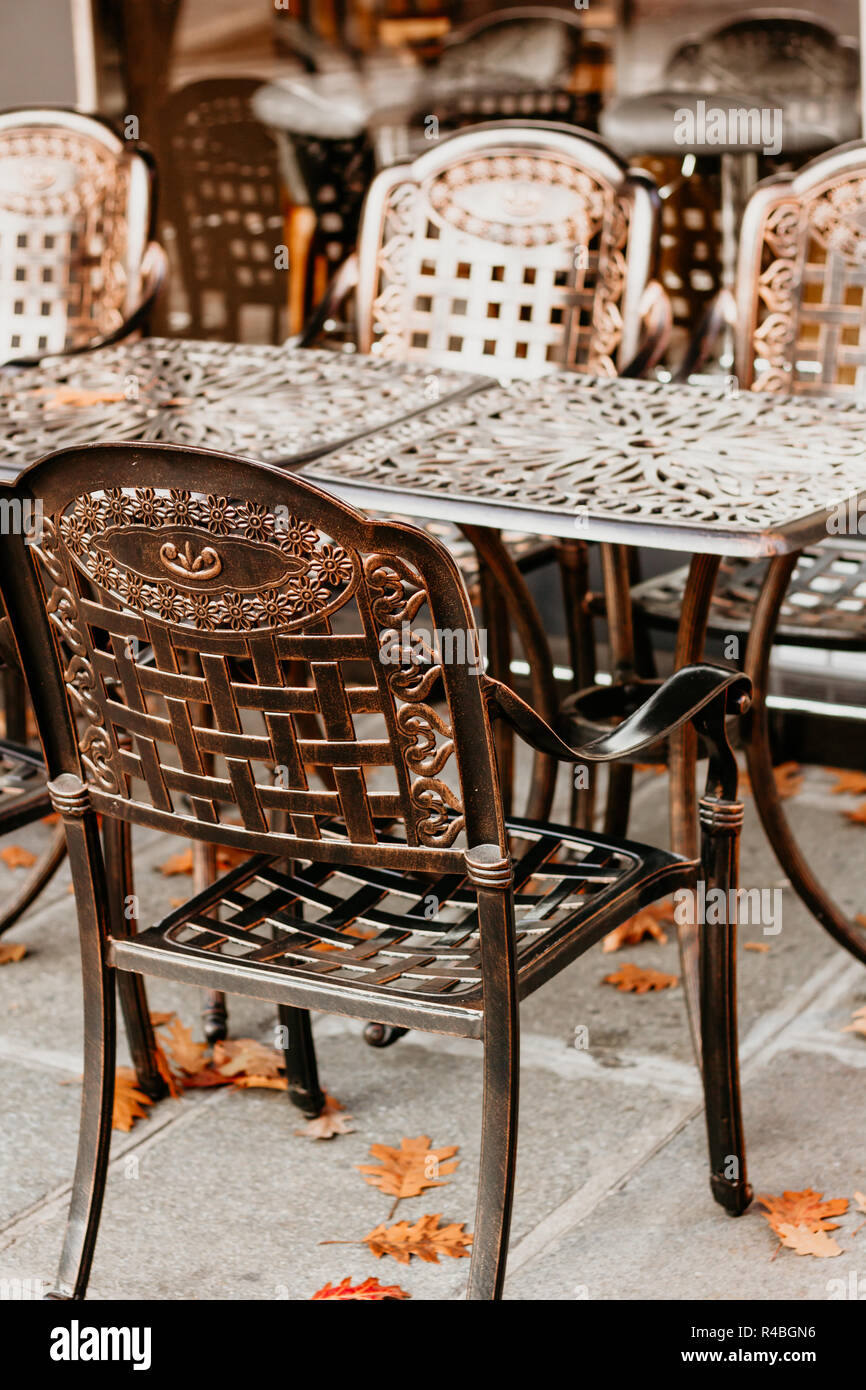 View on a French cafe terrasse in Paris in Autumn Stock Photo - Alamy