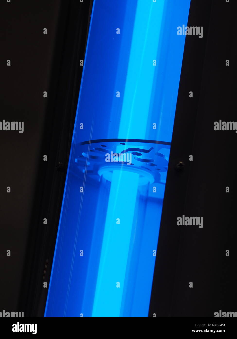 Blue UV light source in an industrial pipe arrangement Stock Photo - Alamy