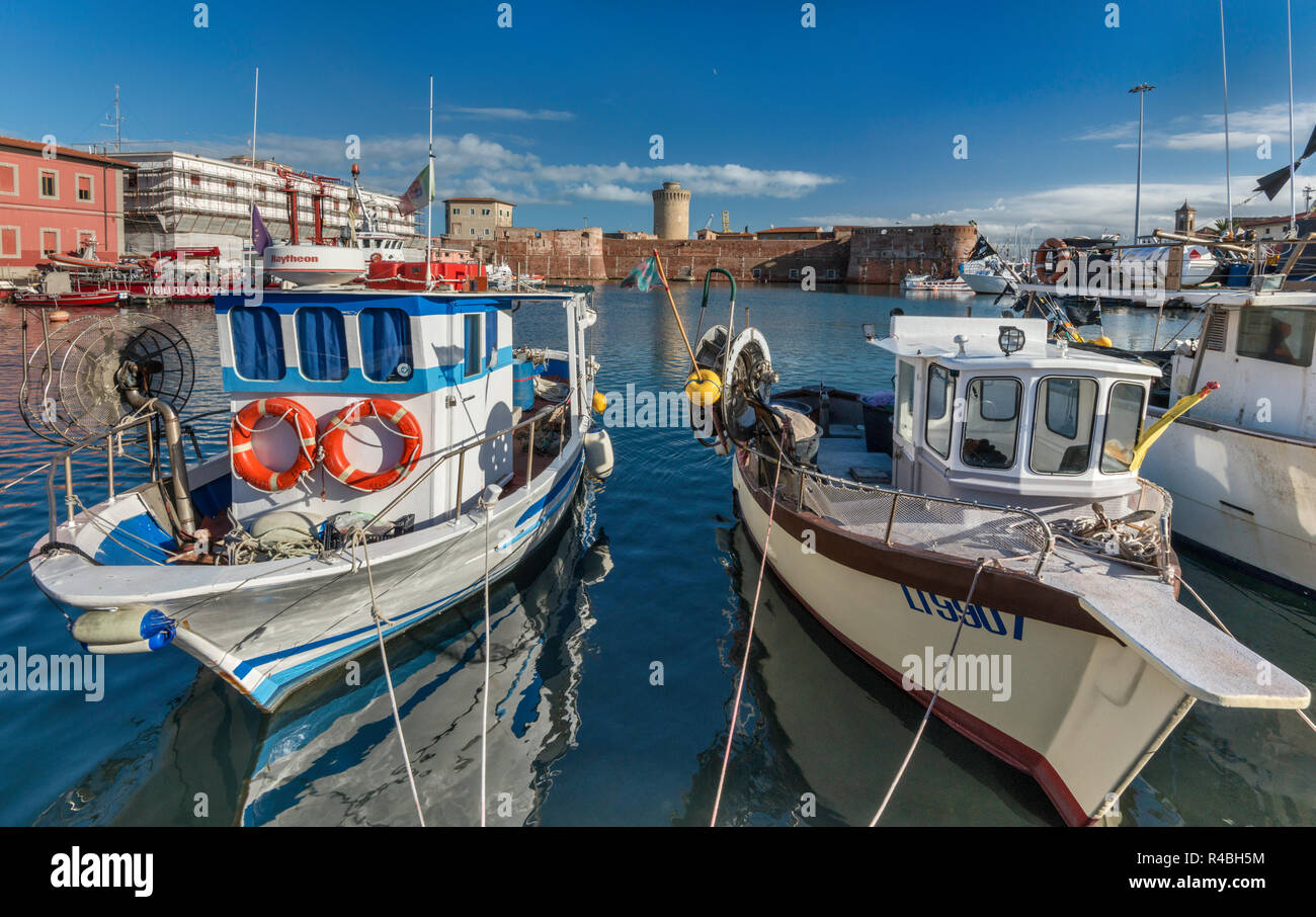 Fishing boats at port, Fortezza Vecchia (Old Fortress), medieval fort ...