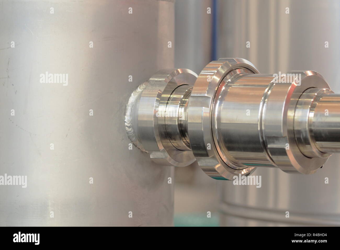 Industrial stainless steel flange connections on a fluid tank Stock ...