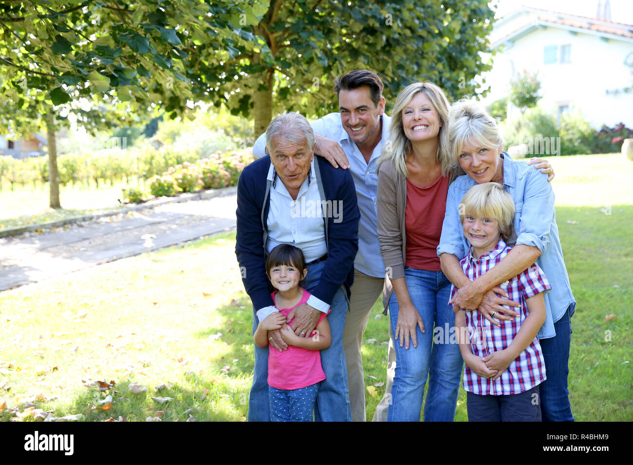 Portrait of happy family at grandparents's house Stock Photo - Alamy