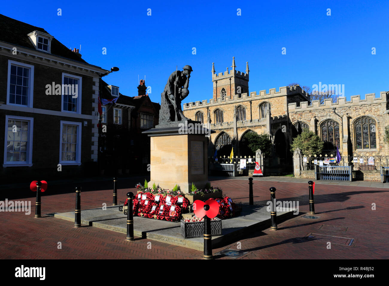 The War memorial and All Saints church, Huntingdon town, Cambridgeshire ...