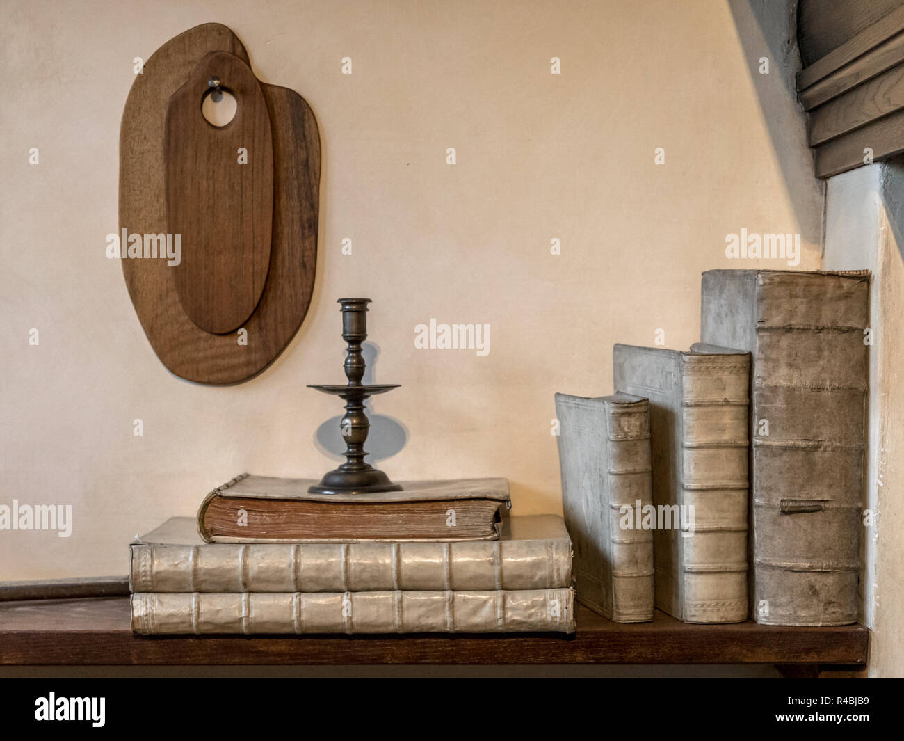 Books on a shelf in Artist atelier study room used by dutch master ...