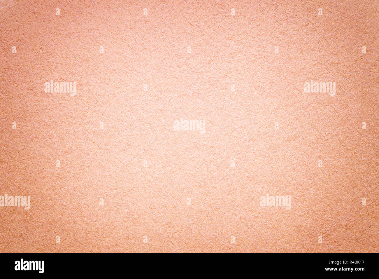 Texture of vintage dark rose gold paper background with vignette ...