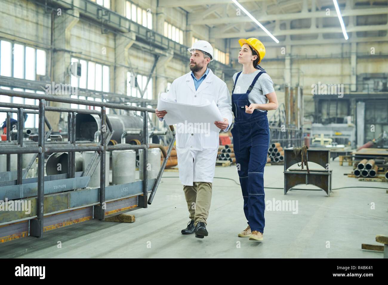 Engineer Inspecting Factory Stock Photo - Alamy