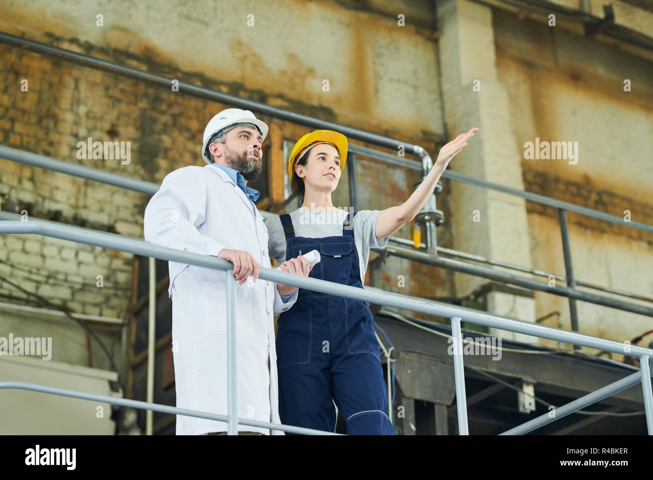 Giving Tour of Factory Stock Photo - Alamy