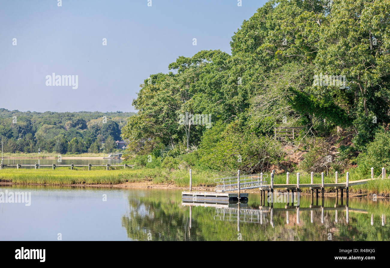 Landscape with water, docks and wetlands Stock Photo - Alamy