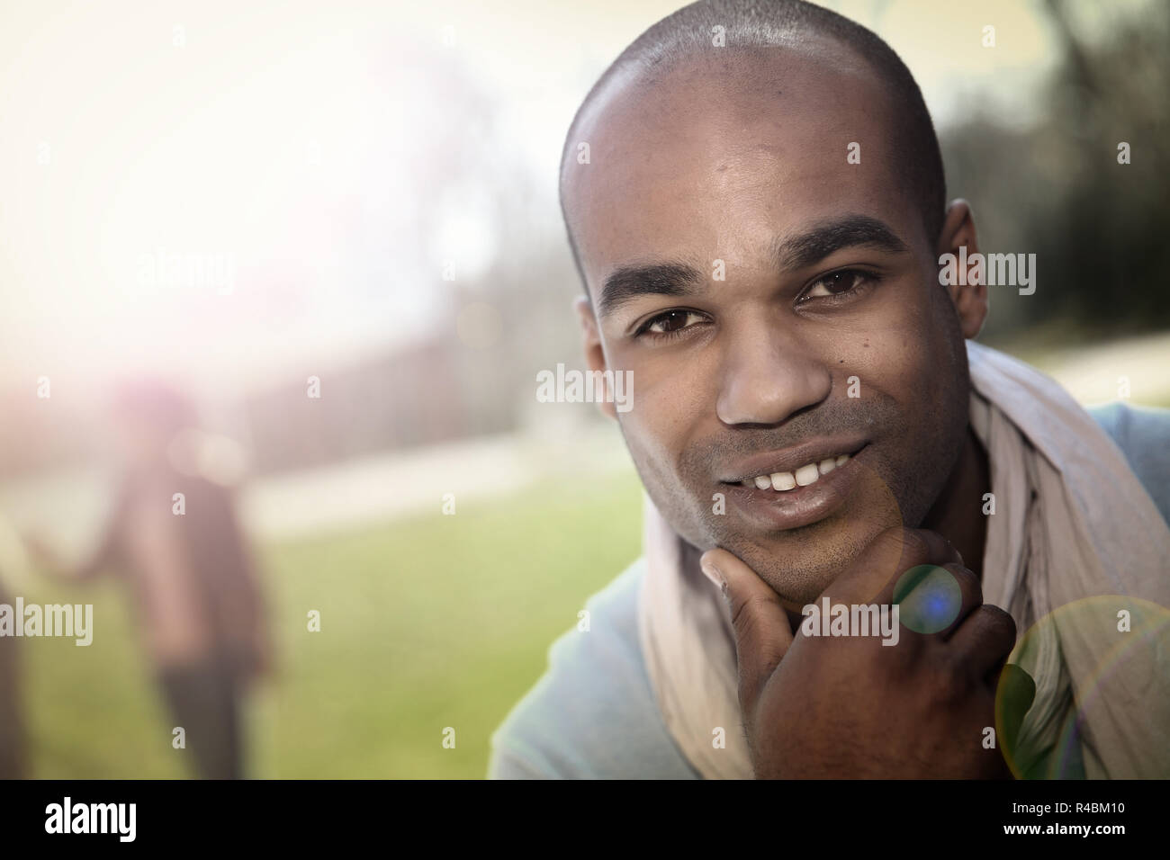 Portrait of smiling student at college campus Stock Photo - Alamy
