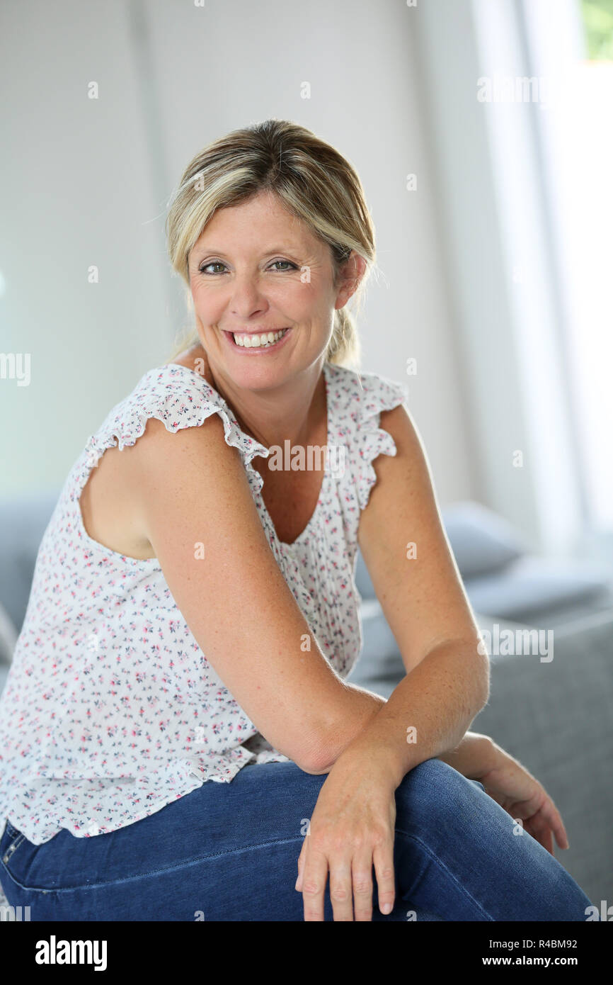 Beautiful 40-year old woman at home Stock Photo - Alamy