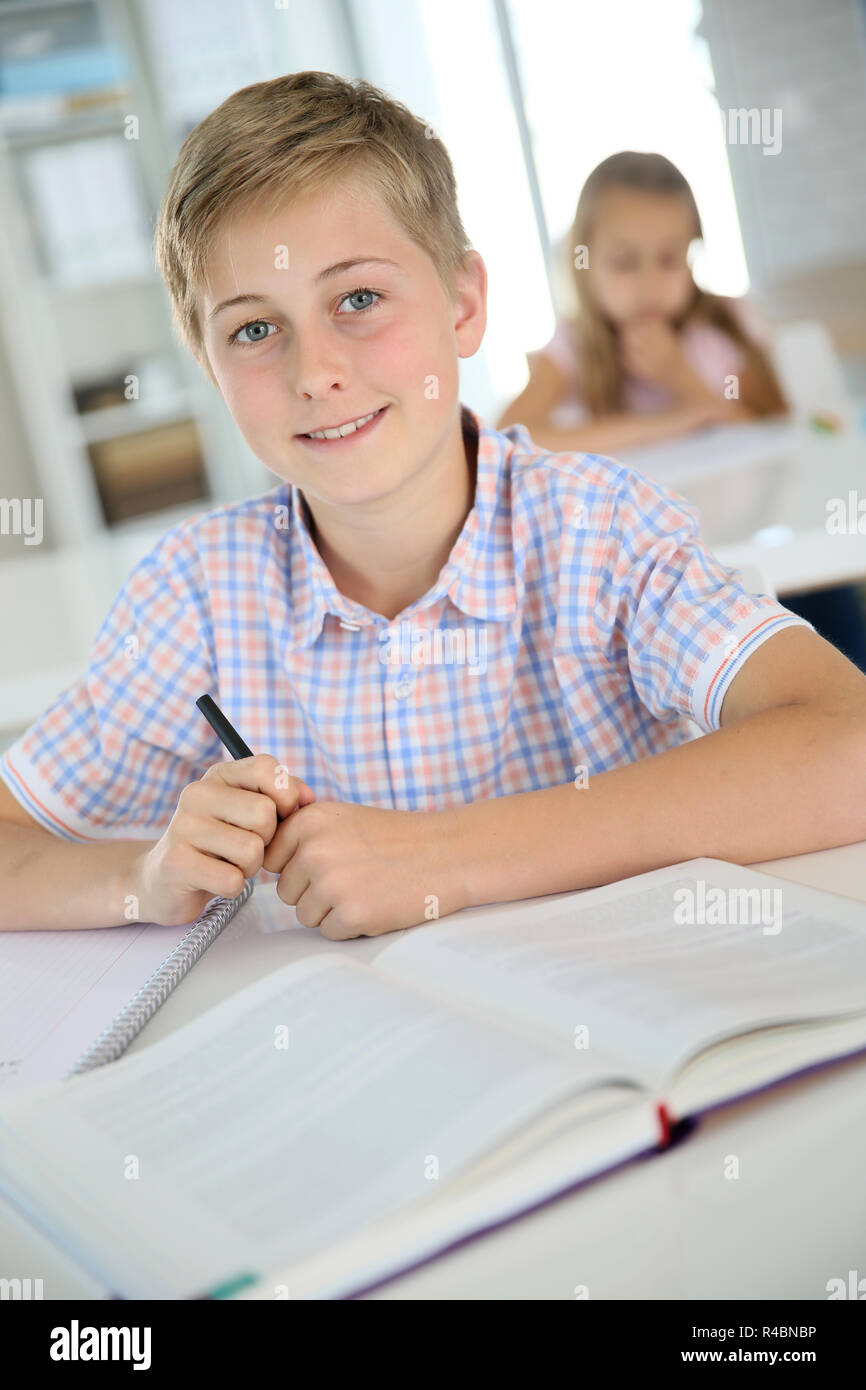 Portrait of 12-year-old boy in classroom Stock Photo - Alamy