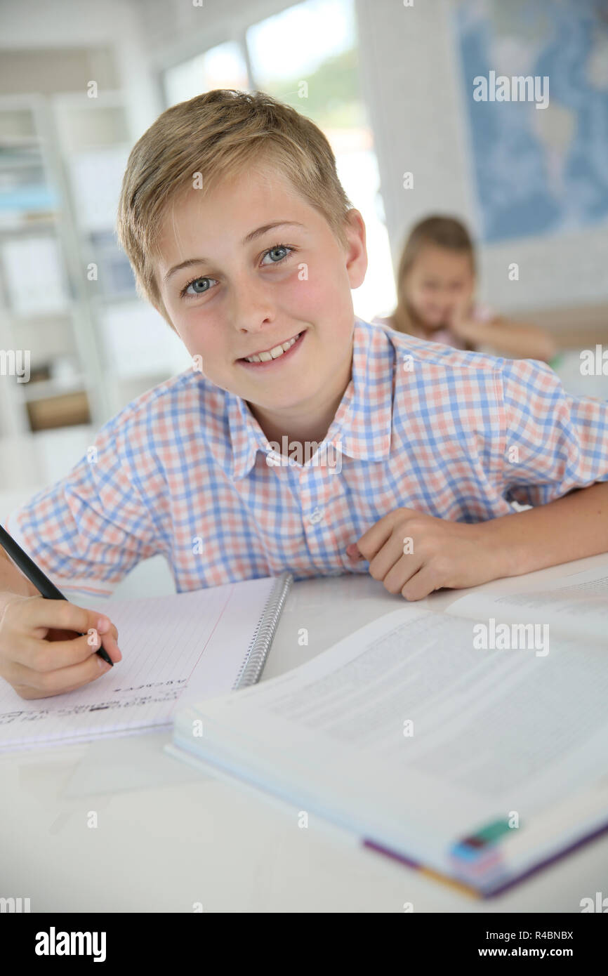 Portrait of 12-year-old boy in classroom Stock Photo - Alamy