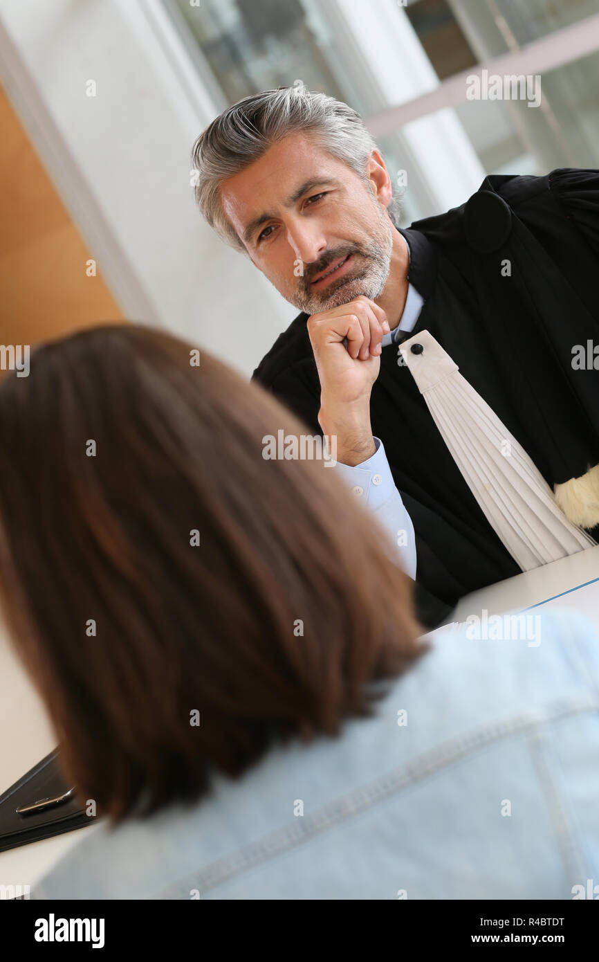 Lawyer meeting client in courthouse office Stock Photo - Alamy
