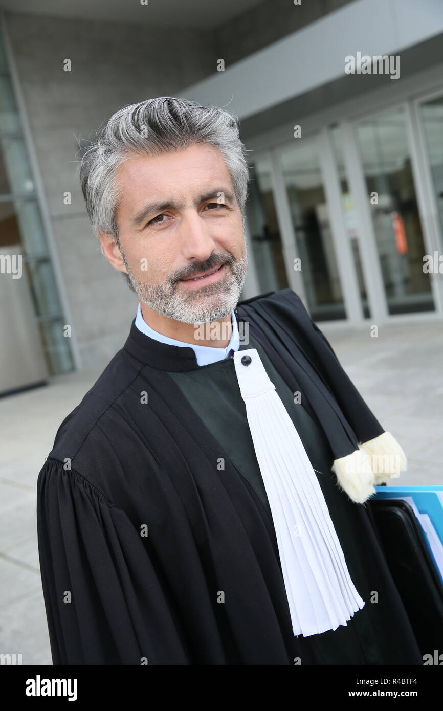 Portrait of lawyer standing outside courthouse building Stock Photo - Alamy