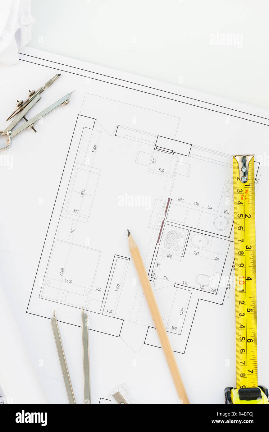 Creative flat lay overhead top view blueprints architectural flat ...