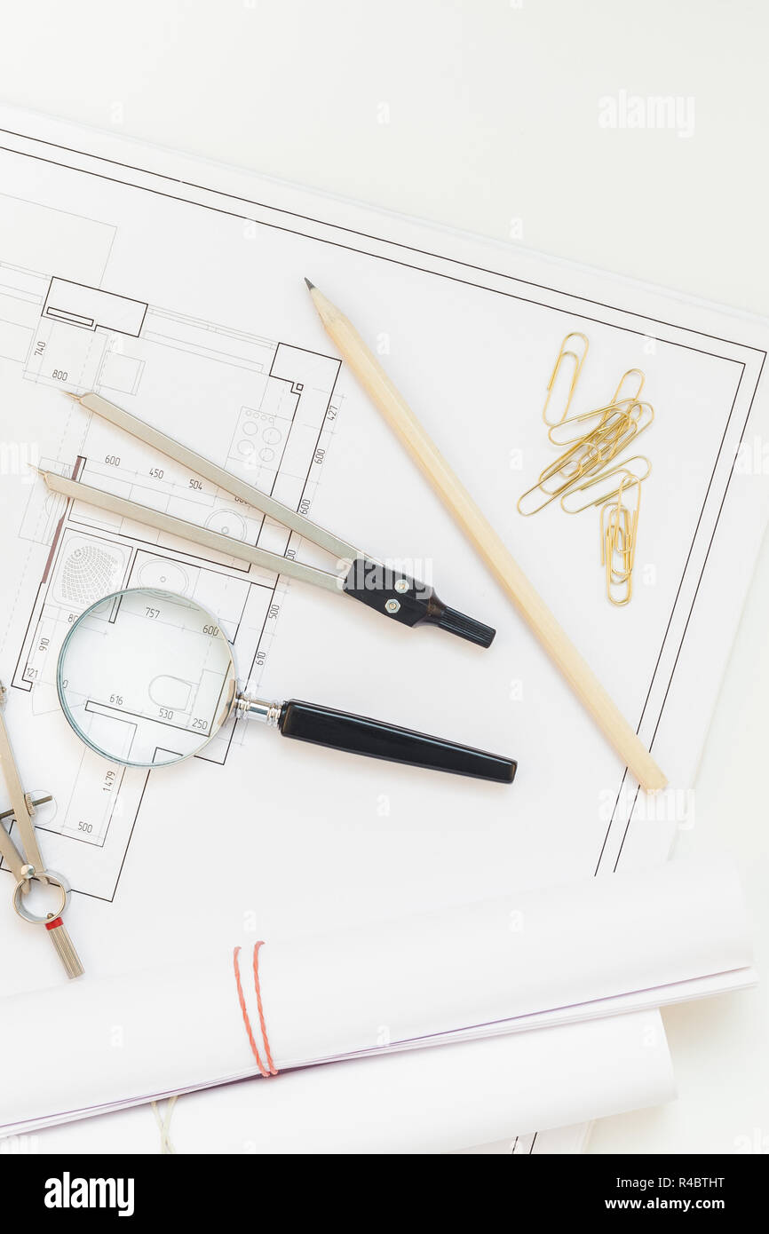 Creative flat lay overhead top view blueprints architectural flat ...