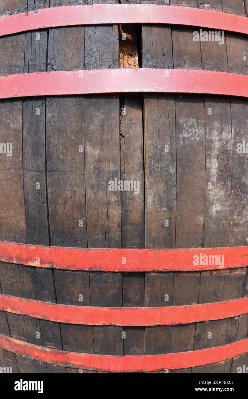 Detail of the big wooden hogshead with red iron tyres Stock Photo - Alamy