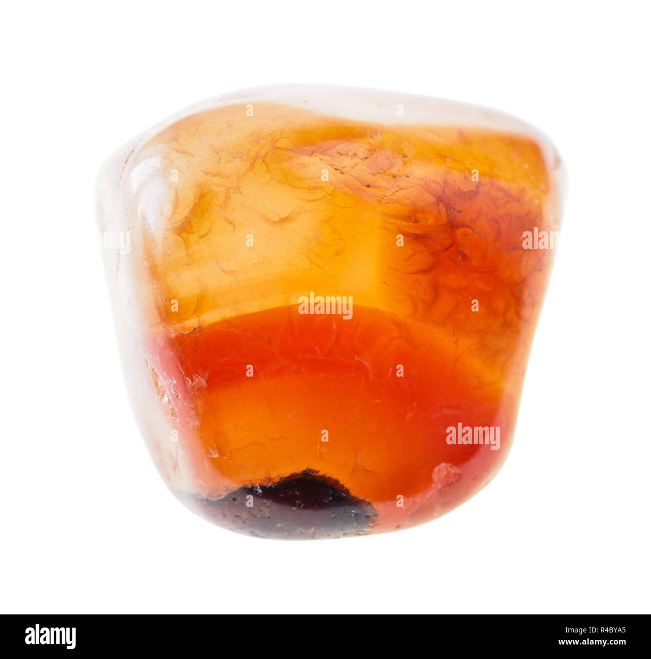 macro shooting of natural mineral rock specimen - tumbled carnelian ...