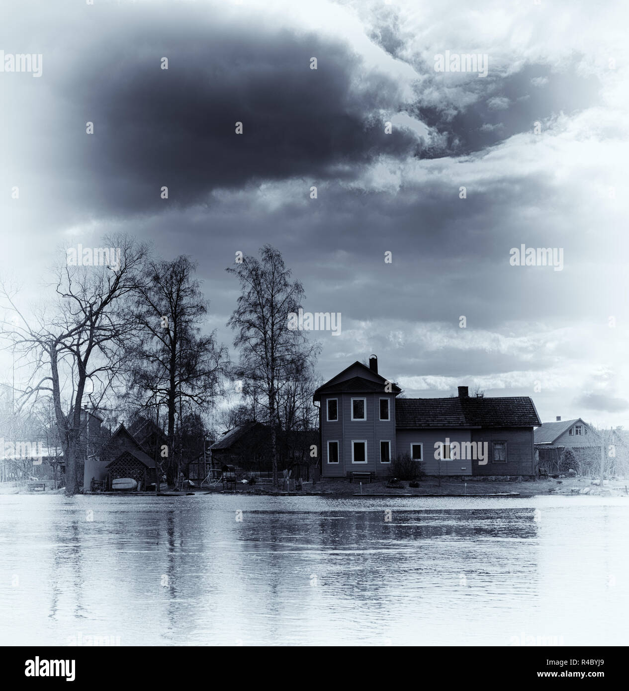 Vertical vintage vibrant blue sepia house on waters background b Stock ...