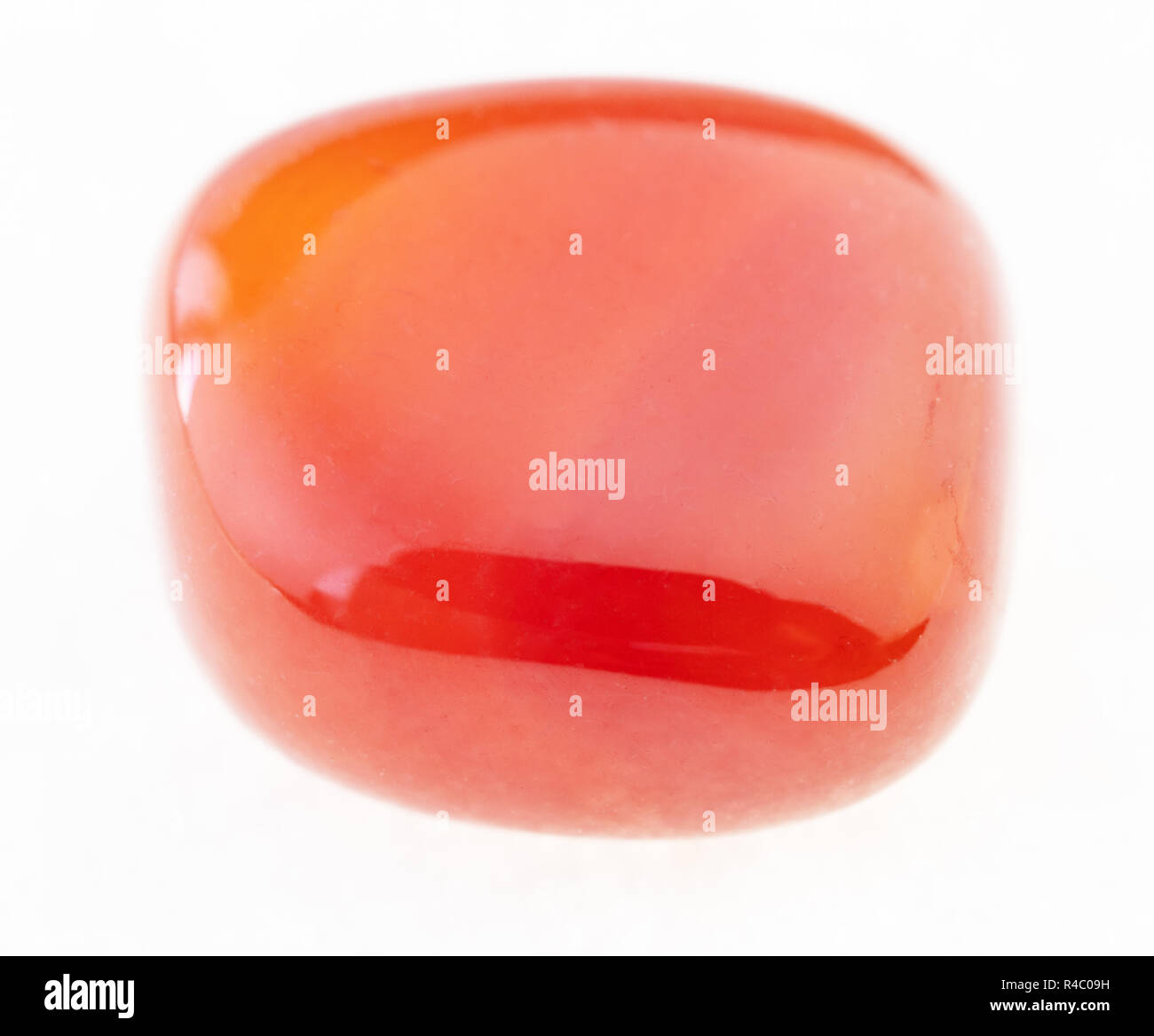 macro shooting of natural mineral rock specimen - tumbled carnelian ...