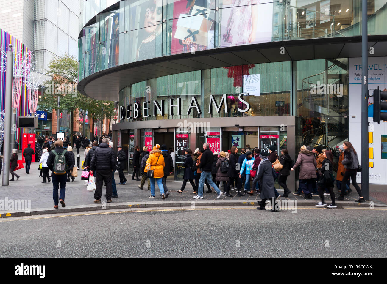 People walking past Debenhams department store in Liverpool One, Lord ...